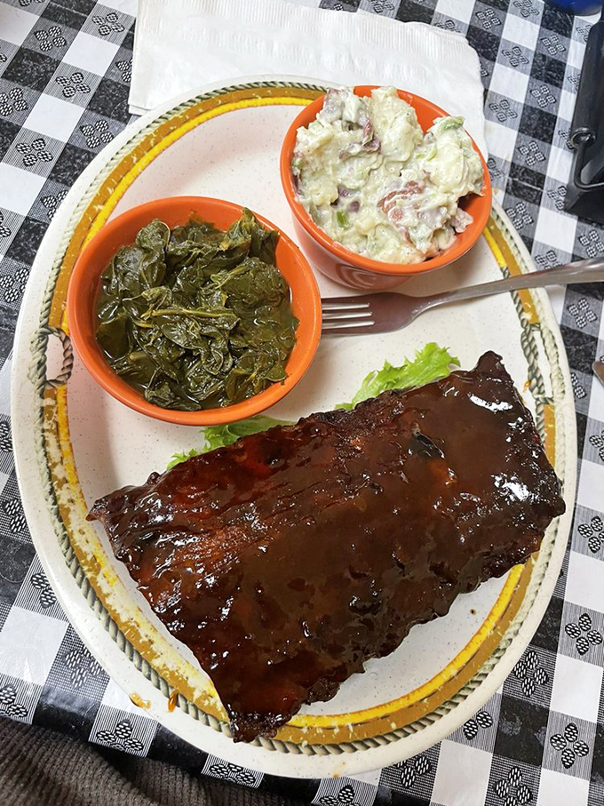Those ribs have the perfect lacquer&mdash;like they've been polished by barbecue angels. The collards and potato salad provide the perfect counterpoint.