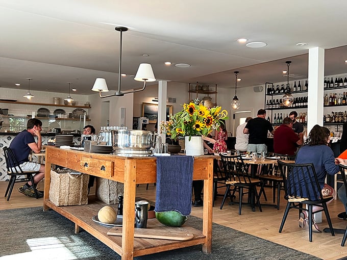 The kind of rustic-chic dining room where strangers become friends and nobody rushes you through that last perfect bite.