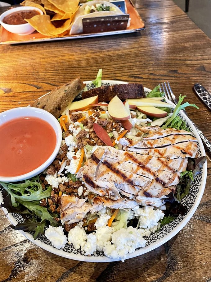 A salad that finally answers the eternal question: "Can healthy food spark joy?" Spoiler alert: when grilled chicken and fresh produce unite, magic happens.