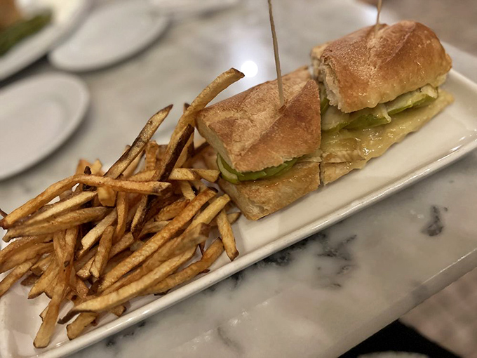 This sandwich isn't just lunch&mdash;it's architecture. Those hand-cut fries aren't sidekicks; they're co-stars in this delicious production.