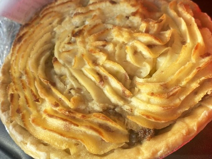 Shepherd's pie with its golden peaks of mashed potatoes – comfort food cartography mapping the route straight to your happy place.