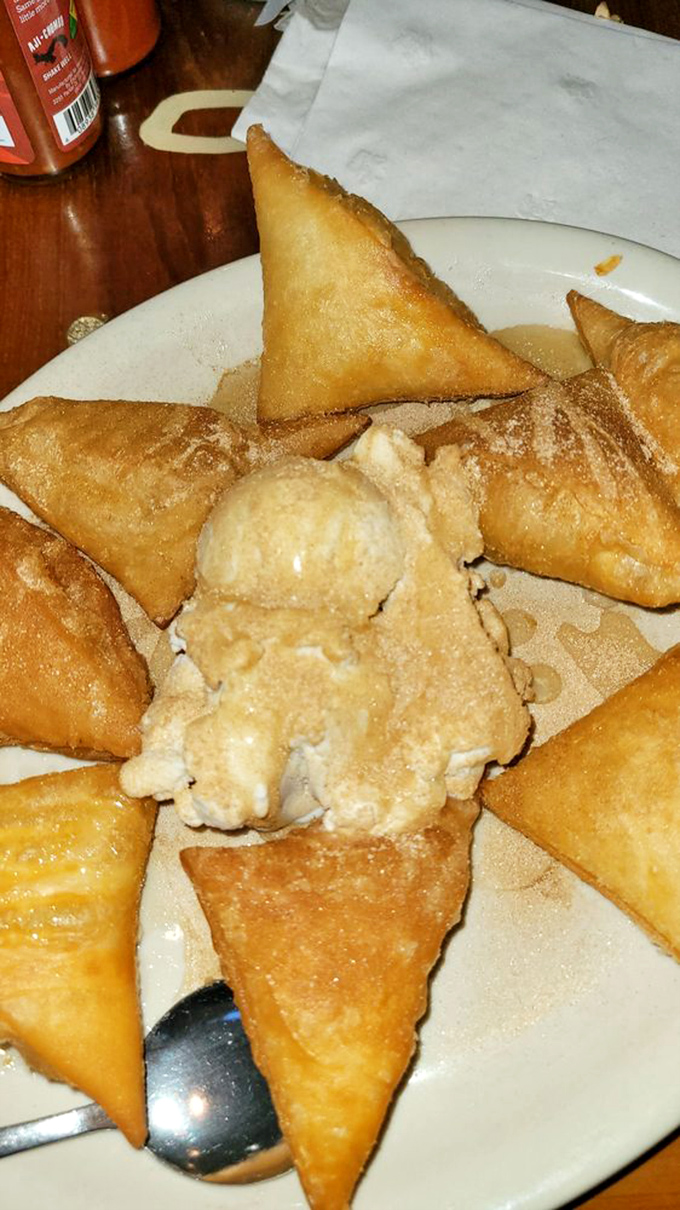 Sopapillas that could make a dessert skeptic weep with joy. That vanilla ice cream melting into the honey-drizzled pillows? Pure poetry.