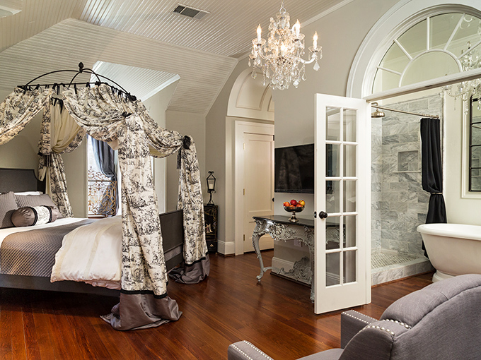A room where fantasy and reality dance together beautifully. That canopy bed with its delicate fabric draping might just ruin ordinary beds for you forever.