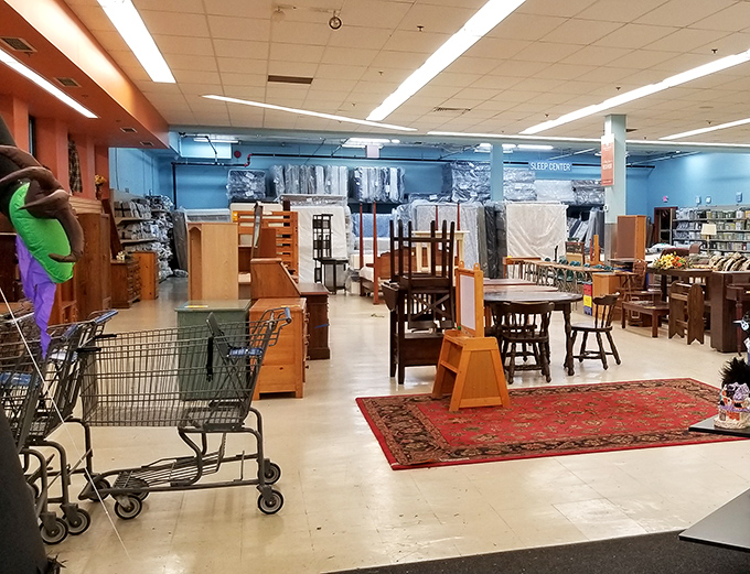 Wood furniture gleams under the lights, each piece with its own history and ready to start a new chapter in someone's home.