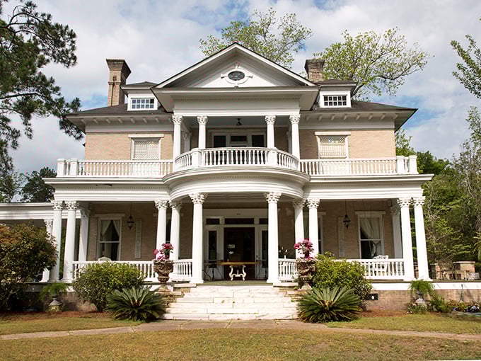 The Sparks-Bennett House combines architectural grandeur with homey touches like potted plants and porch furniture, proving these mansions aren't just for show.
