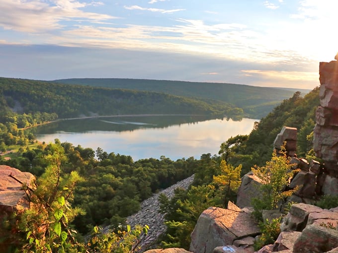Devil's Lake offers sunset views that make you question whether you're still in Wisconsin or somehow teleported to a national park out west.