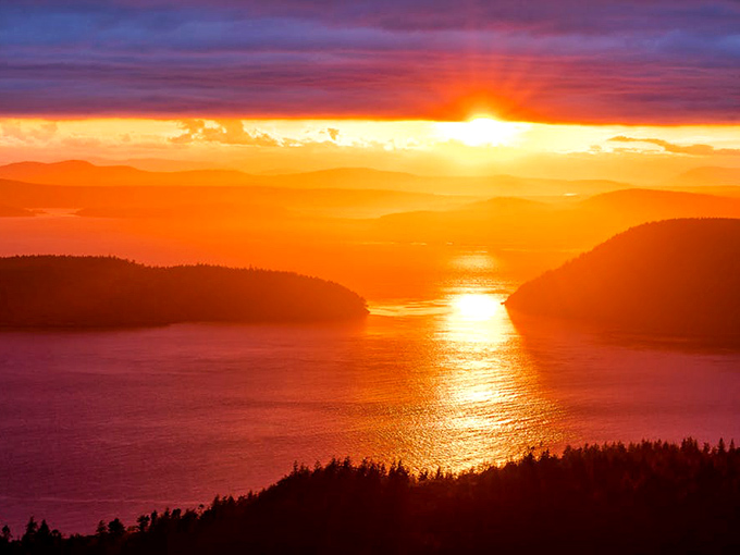 Nature's nightly light show over Bellingham Bay comes standard with every sunset, no premium package required.