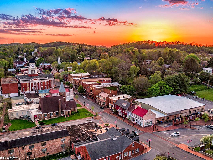 Sunset paints Jonesborough in golden hues, transforming brick buildings into glowing embers and church steeples into silhouettes against the Tennessee sky.