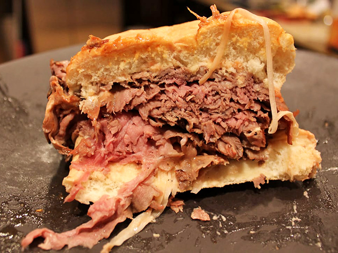 Look at those delicate layers of pink beef! It's like nature's lasagna—if lasagna were made of perfectly smoked meat and happiness.