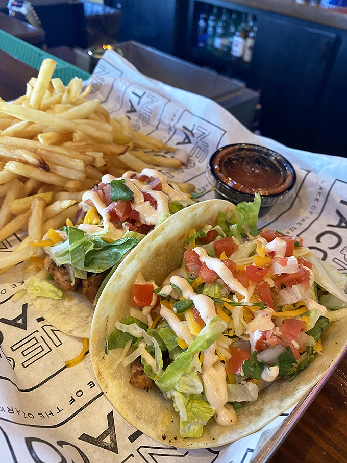 Tortillas cradling crispy goodness, accompanied by fries that didn't dare show up frozen &ndash; a vacation on a plate.