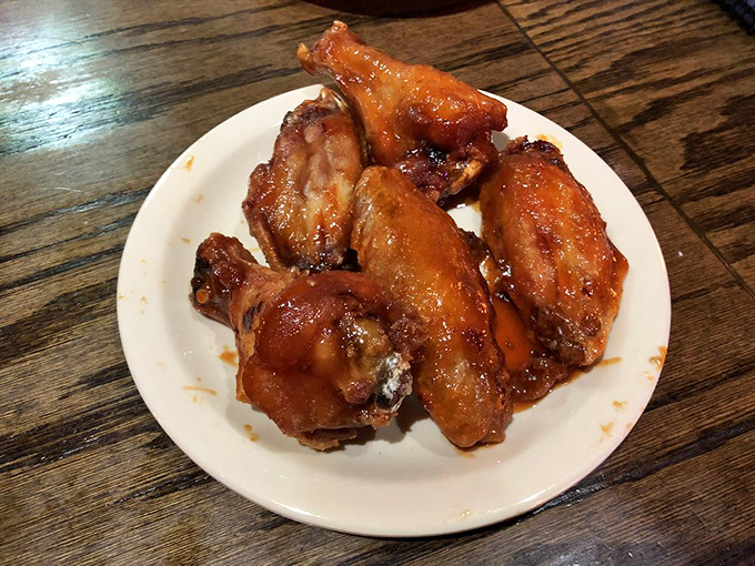 The Thai wings offer a vacation for your taste buds without the hassle of TSA. Sticky, sweet, and worth every napkin you'll need.