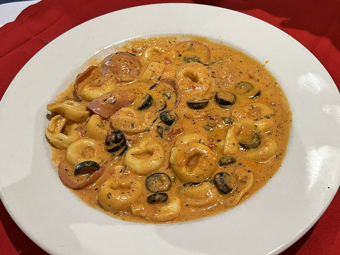 This Tortellini Siciliano with olives and sausage makes you wonder if you should have booked your vacation to Sicily instead of scrolling through Facebook.
