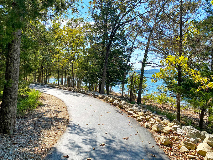 The trail gently hugs the shoreline, offering continuous lake views that would make even the most dedicated couch potato consider a lifestyle change.