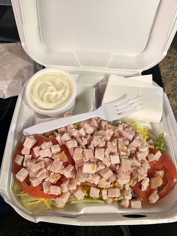 This chef salad might be the only time you'll see people fighting over vegetables at Chuck's. Those ham cubes mean business.