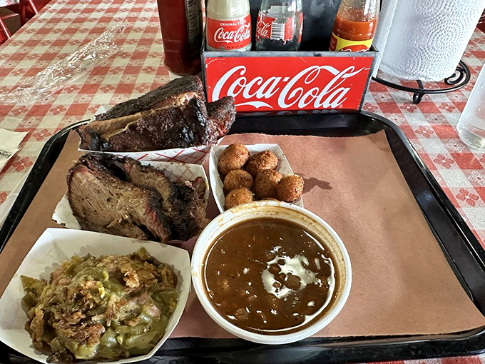 Meat and three sides isn't just a meal&mdash;it's a Southern handshake. That brisket's smoke ring is like nature's way of saying "you're welcome."