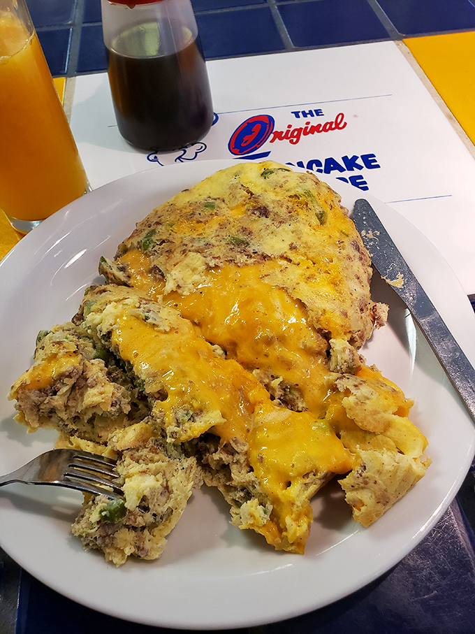This isn't just an omelet&mdash;it's an architectural achievement of eggs, cheese, and fillings that would make Frank Lloyd Wright weep with joy.
