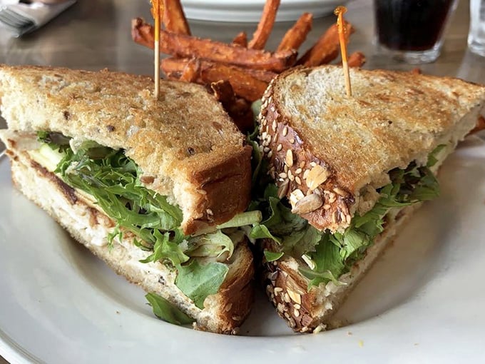 A sandwich that makes you question why you ever settled for boring lunches. Those sweet potato fries are the supporting actors who steal the show.