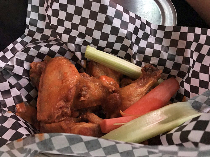 Naked wings that prove sometimes the simplest pleasures are the most profound – served with nature's perfect wing companions: celery and carrot sticks.