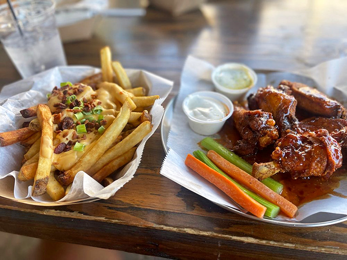 The ultimate dynamic duo&mdash;wings and loaded fries. Like Batman and Robin, if they were delicious and didn't fight crime.