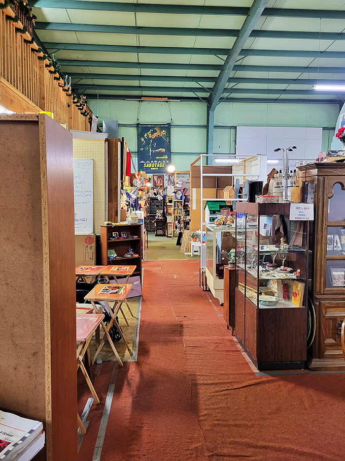 Booths create neighborhoods of collectibles, each with its own personality. Walking these aisles is like channel-surfing through America's material history.