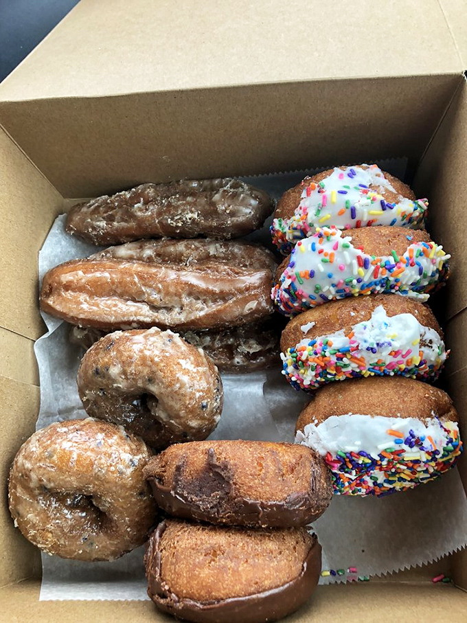 The universal truth of happiness: a dozen varied donuts from Bill's, where each one fights to be your favorite in a delicious battle royale.