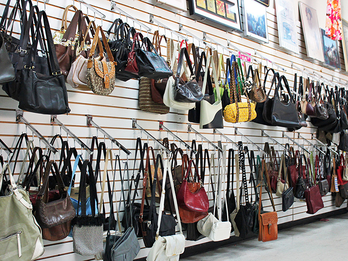 Handbag heaven or purse purgatory? For the patient treasure hunter, last season's designer bags hang like ripe fruit waiting to be plucked from this leather orchard.