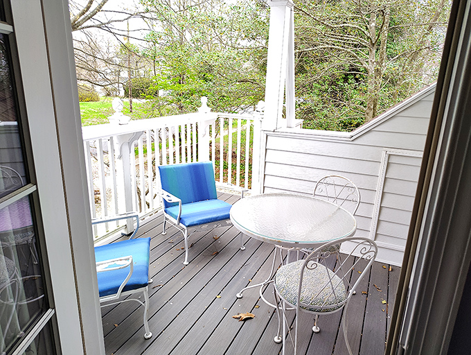 This private balcony offers just enough space for morning coffee contemplation or evening wine sipping&mdash;life's most important activities, if we're being honest.