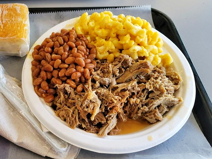 Pulled pork that's spent quality time with smoke and patience, ready to transport you to barbecue nirvana.