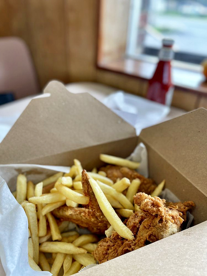 The classic box meal&mdash;where crispy chicken meets golden fries in a cardboard container that might as well be labeled "happiness to go."