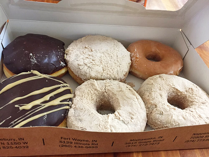 A box of mixed donuts&mdash;the adult version of a jewelry case. That chocolate-glazed beauty might be worth proposing to.