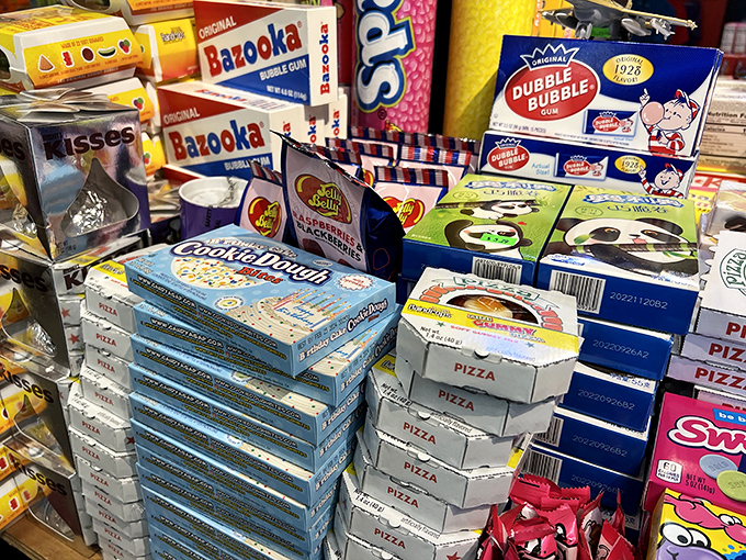 Cookie Dough Bites and candy pizza boxes stacked like the architectural plans for your dentist's summer home.