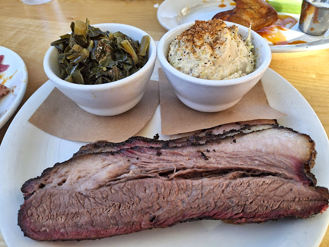 Ribs and sides that make you want to write home about them, if your hands weren't too busy reaching for another bite. 