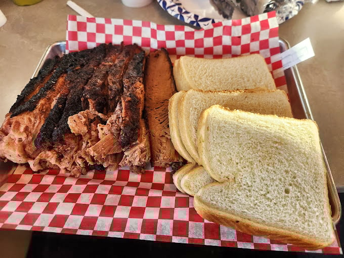 Brisket and bread&mdash;a relationship so perfect it makes Romeo and Juliet look like they needed couples therapy. That smoke ring tells the whole story.
