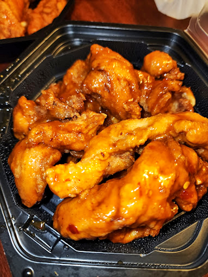 Buffalo sauce that clings to each wing with the determination of a toddler refusing to leave a toy store. Gloriously messy eating at its finest.