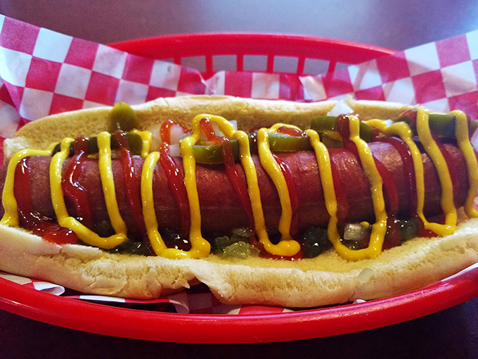 Behold the classic hot dog, dressed to impress. Those perfectly zigzagged lines of mustard and ketchup are the fashion statement every wiener dreams of.
