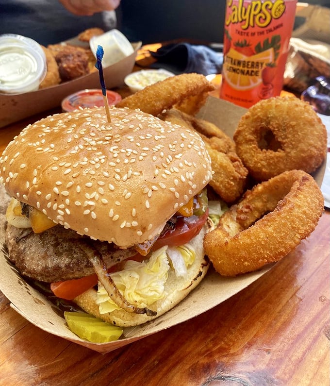 Even the burgers at Neptune's Net have ocean views. This hefty handful comes with a side of golden onion rings that deserve their own ZIP code.