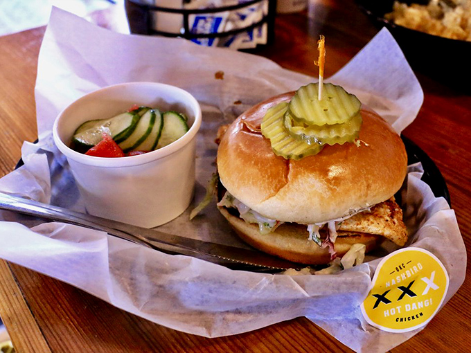 The sandwich that launched a thousand cravings. That pickle crown isn't just garnish—it's the tiara on Nashville royalty.