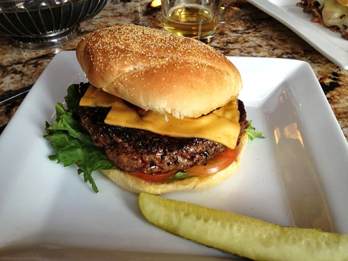 The burger that launched a thousand road trips. That melted cheese is performing what can only be described as a love song to beef.