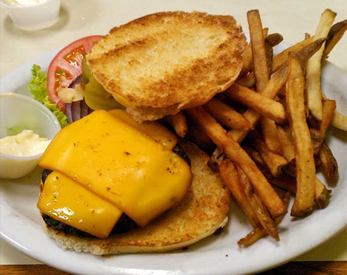 The cheeseburger arrives like a midwestern work of art&mdash;melted cheese cascading down perfectly grilled beef, with fries that demand to be noticed.