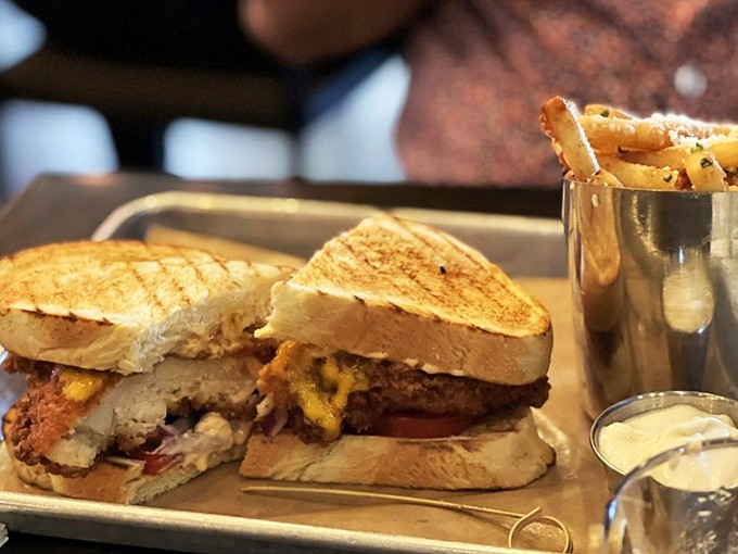 This isn't just a sandwich; it's architecture. Layers of savory goodness that makes you wonder why you ever settled for drive-thru breakfast.