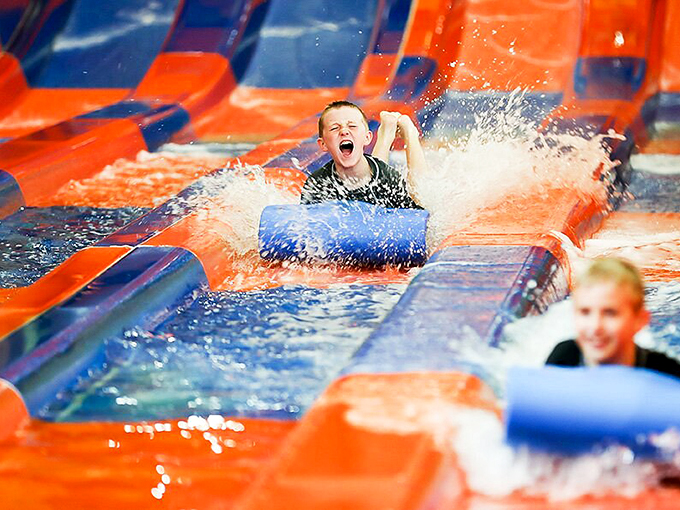 Pure joy caught in mid-splash&mdash;that perfect moment when a water slide delivers exactly what it promised on the brochure.