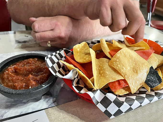 These aren't your average tortilla chips—they're crispy vehicles designed specifically for transporting that homemade salsa from basket to mouth with maximum efficiency.