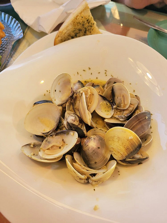 These littleneck clams aren't just opened&mdash;they're practically introducing themselves. Simple, garlicky, and straight from the sea to your table.