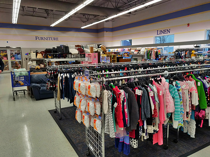 The children's clothing section offers a rainbow of tiny fashions, where outgrown outfits await their next adventure with a new little human. 
