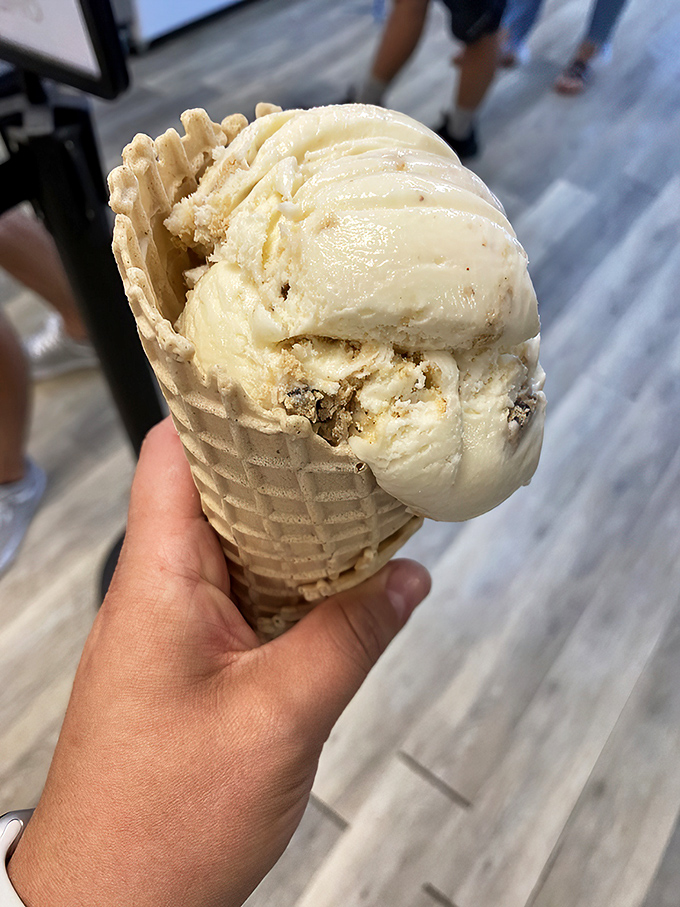 This waffle cone doesn't just hold ice cream; it cradles it like it's protecting the Hope Diamond of dairy products.