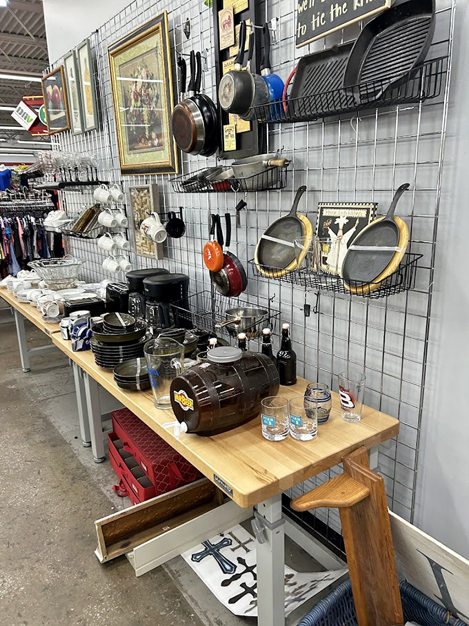 Cast iron pans and kitchen treasures hanging like trophies. These cooking vessels have probably served more family dinners than most restaurants.