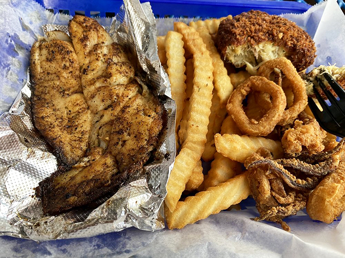 The ultimate marriage of land and sea&mdash;lumpy crab cake embracing crispy fries like they were always meant to be together.