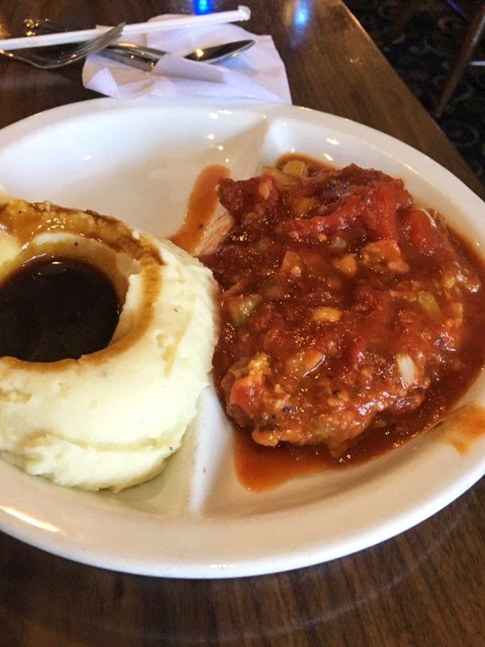 When gravy is practically a birthright. That mashed potato volcano with its savory lava flow deserves its own state monument.