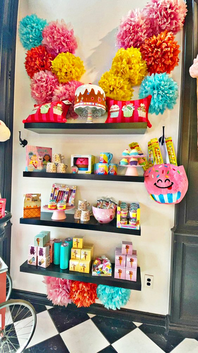 The gift section: where sweet-themed decor and colorful pom-poms create the perfect backdrop for those "I came for candy but left with everything" moments.