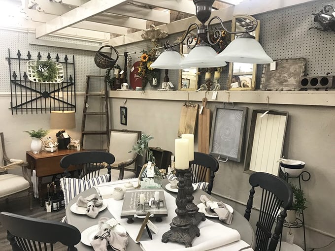 Gather 'round this timeless tableau. Dark wooden chairs surround a table set for ghosts of conversations that happened decades before smartphones existed.